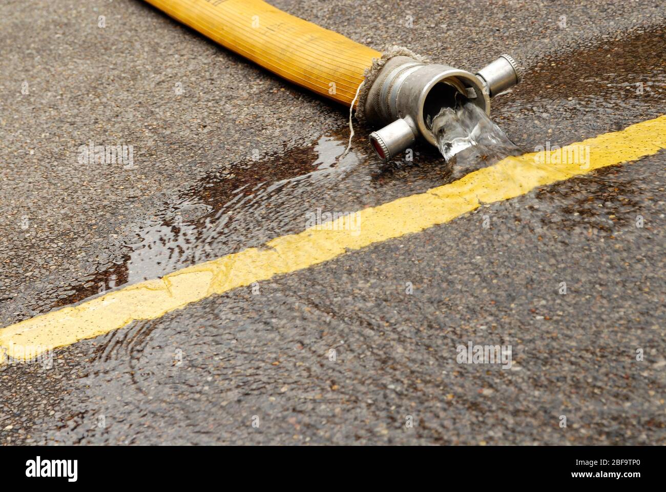 Firemans hose water hi-res stock photography and images - Alamy