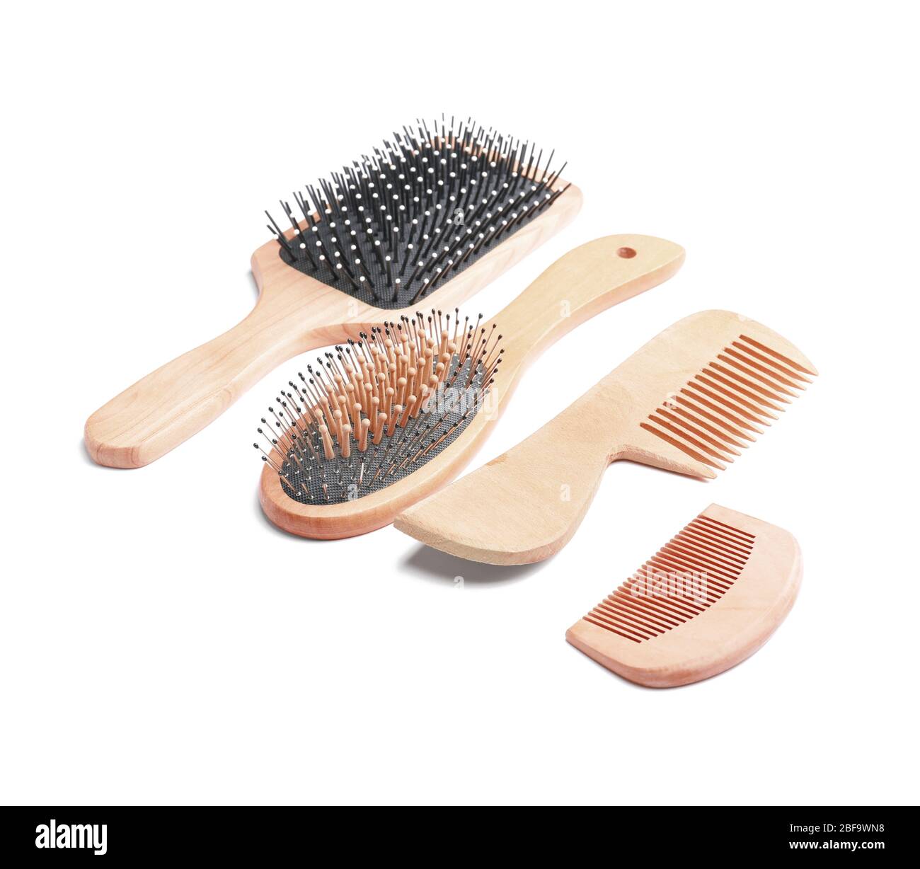 Hair brushes and combs on white background Stock Photo - Alamy