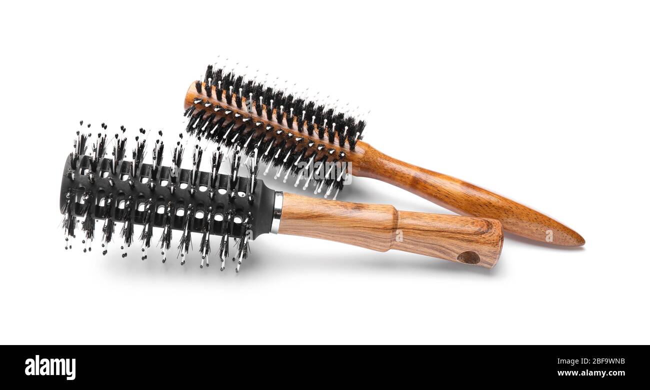 Hair brushes on white background Stock Photo - Alamy