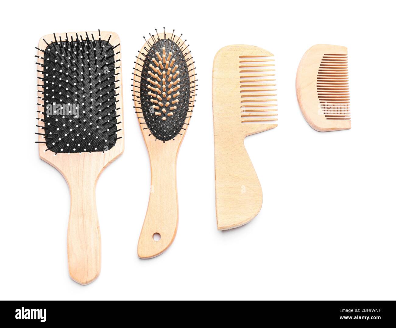 Hair brushes and combs on white background Stock Photo - Alamy