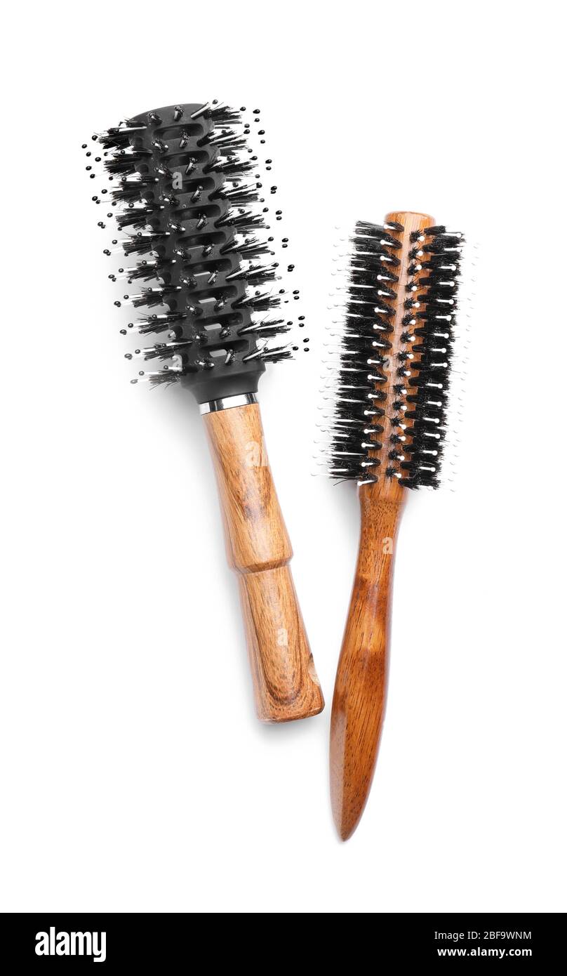 Hair brushes on white background Stock Photo - Alamy