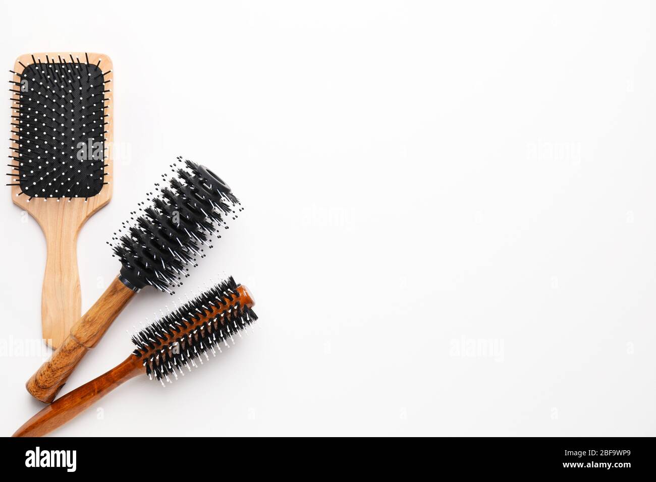 Hair brushes on white background Stock Photo - Alamy