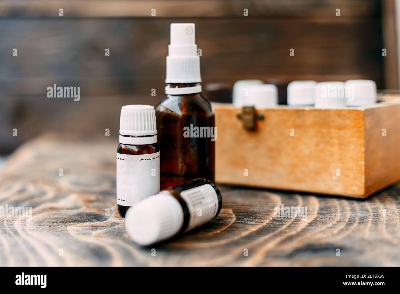 Glass bottles with different scents and exotic types of essential oils ...
