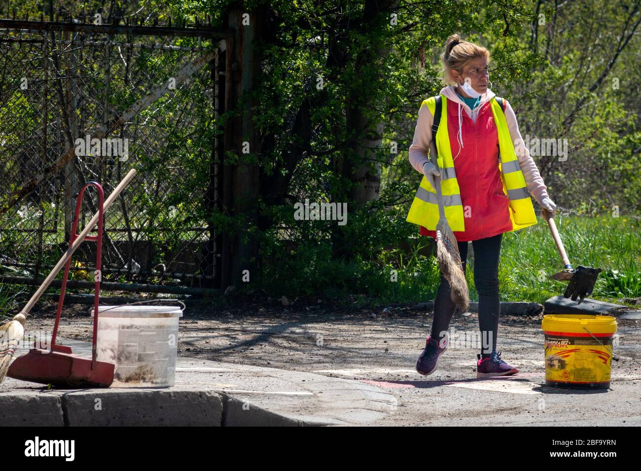 Female street sweeper hi-res stock photography and images - Alamy