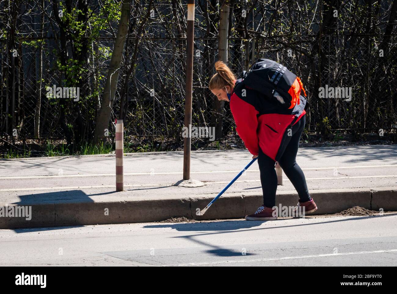Female street sweeper hi-res stock photography and images - Alamy