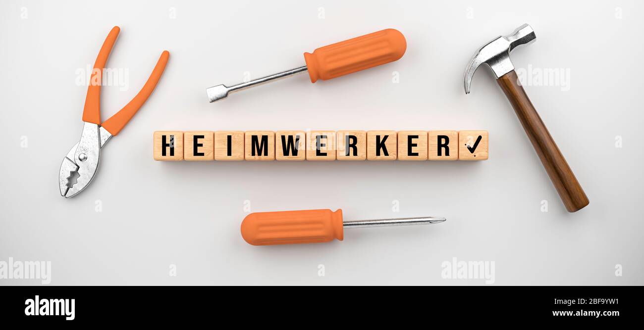 set of tools and cubes with German message for HOME HANDYMAN on white ...