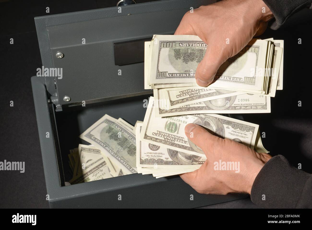 Criminal stealing dollar banknotes from hi-res stock photography and ...