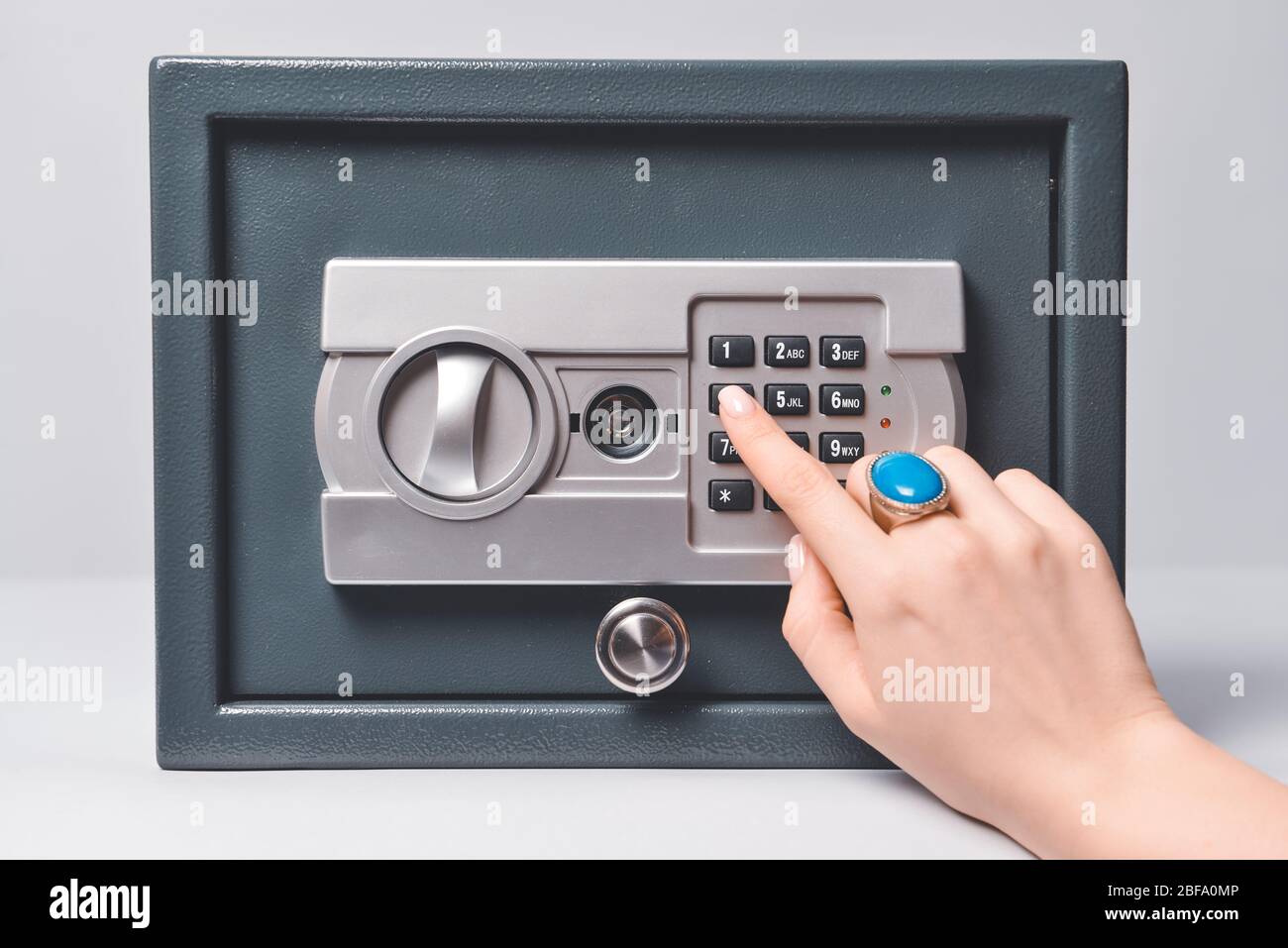Opening locker hand hi-res stock photography and images - Alamy