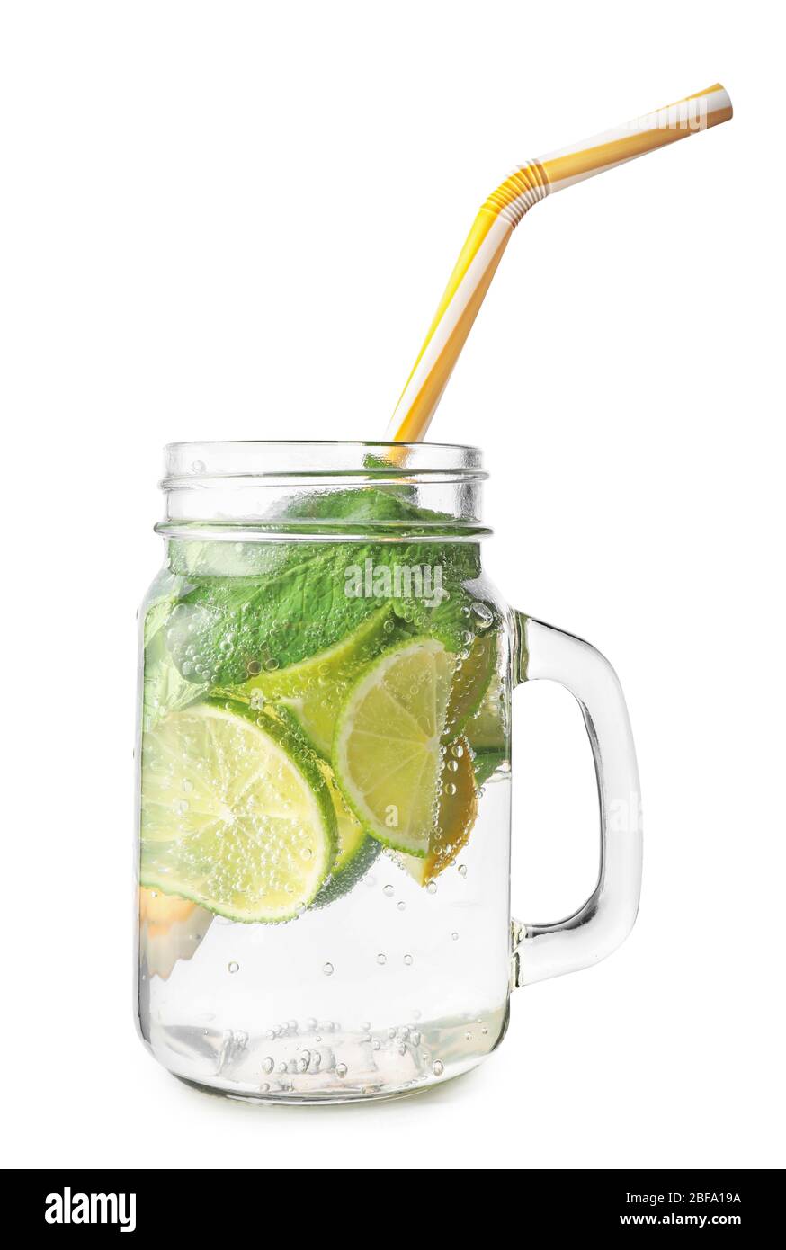 Mason jar of fresh lime lemonade on white background Stock Photo - Alamy