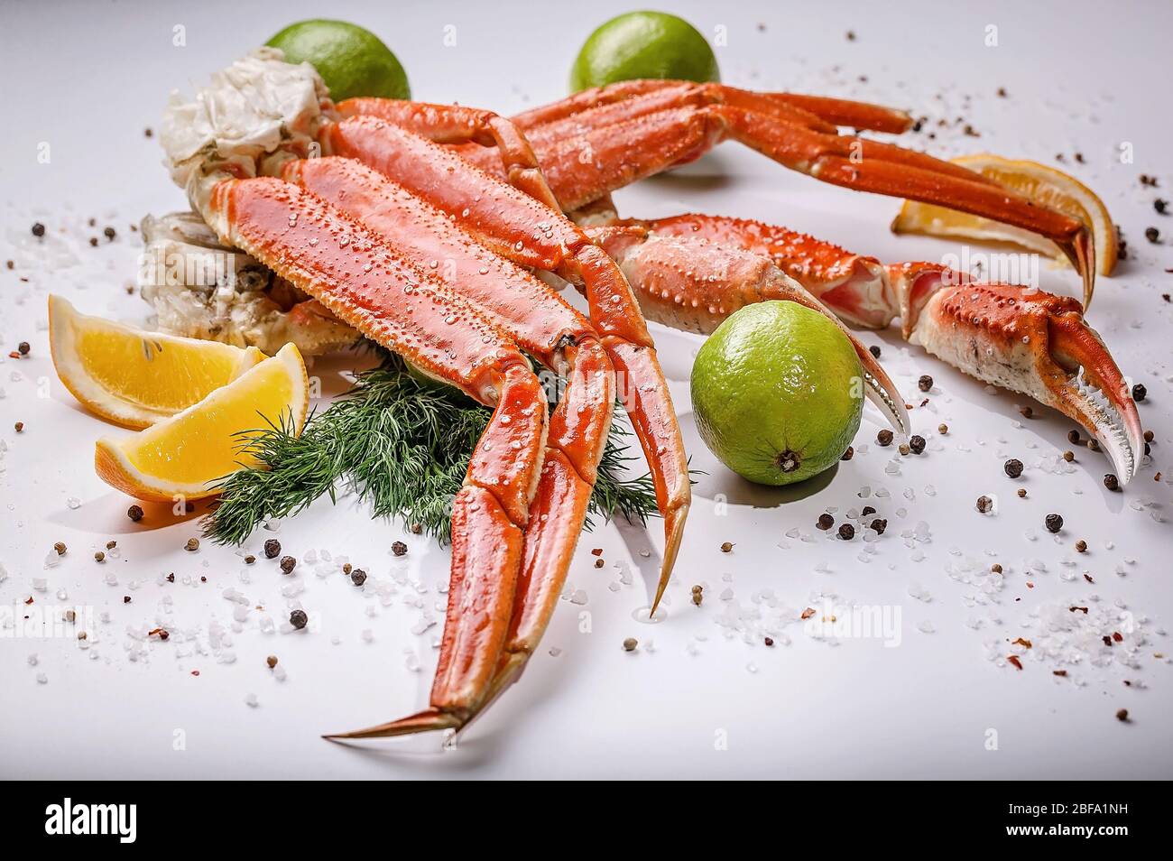 Tasty seafood. Crab claws on white background. Horisontal shot. Close ...