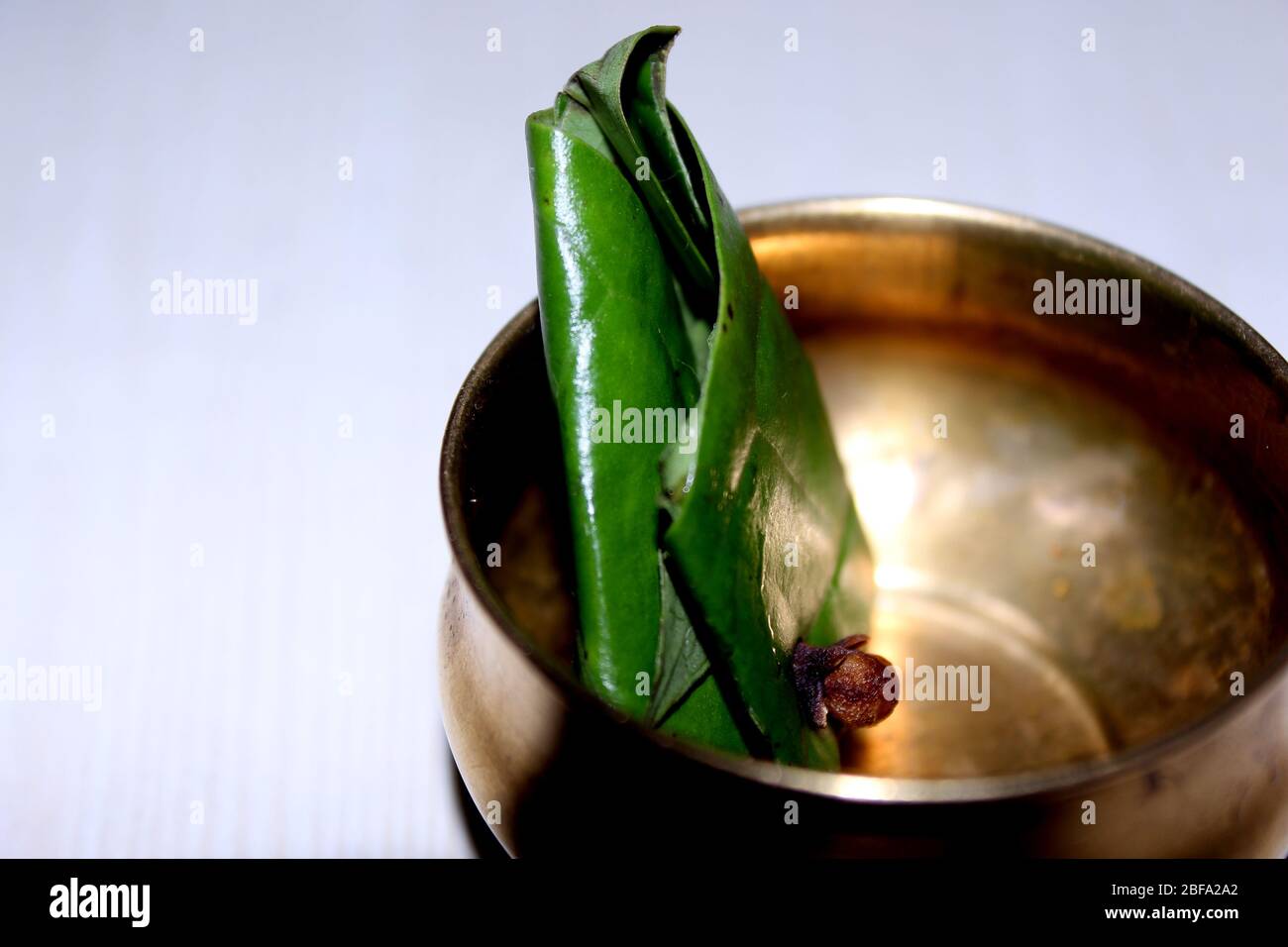 Indian Mouth Freshener Sweet Paan, betel nut leaf served in vintage ...