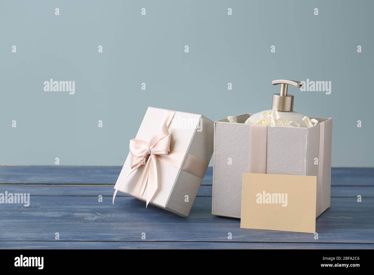 Box with gifts for Mother's Day on table Stock Photo - Alamy