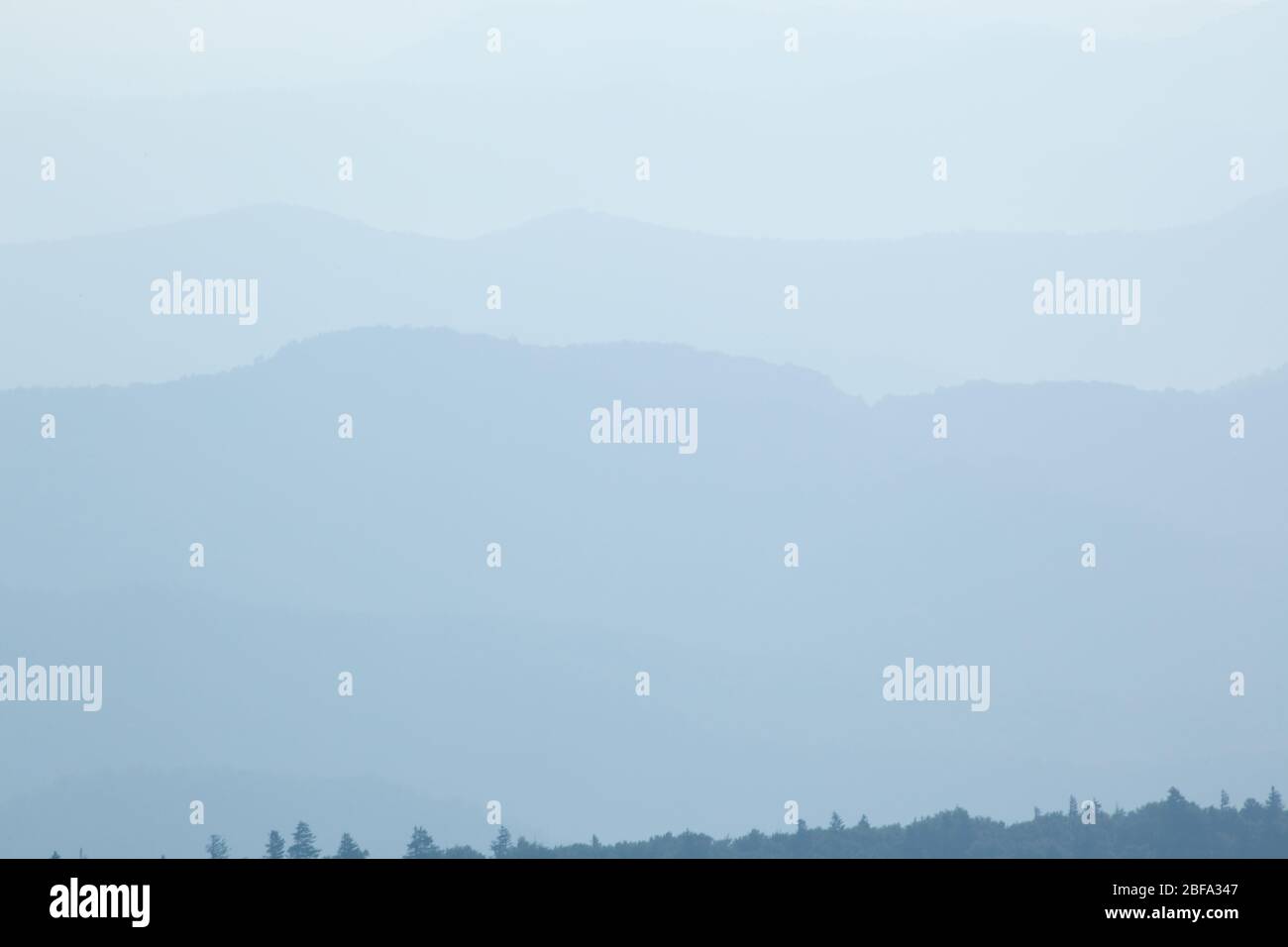 Distant Mountains in a haze Stock Photo - Alamy