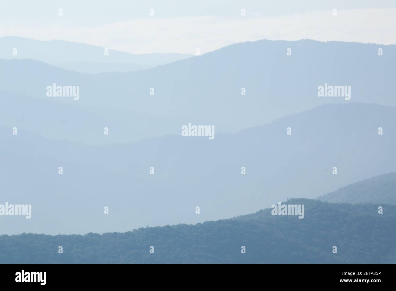Distant Mountains in a haze Stock Photo - Alamy