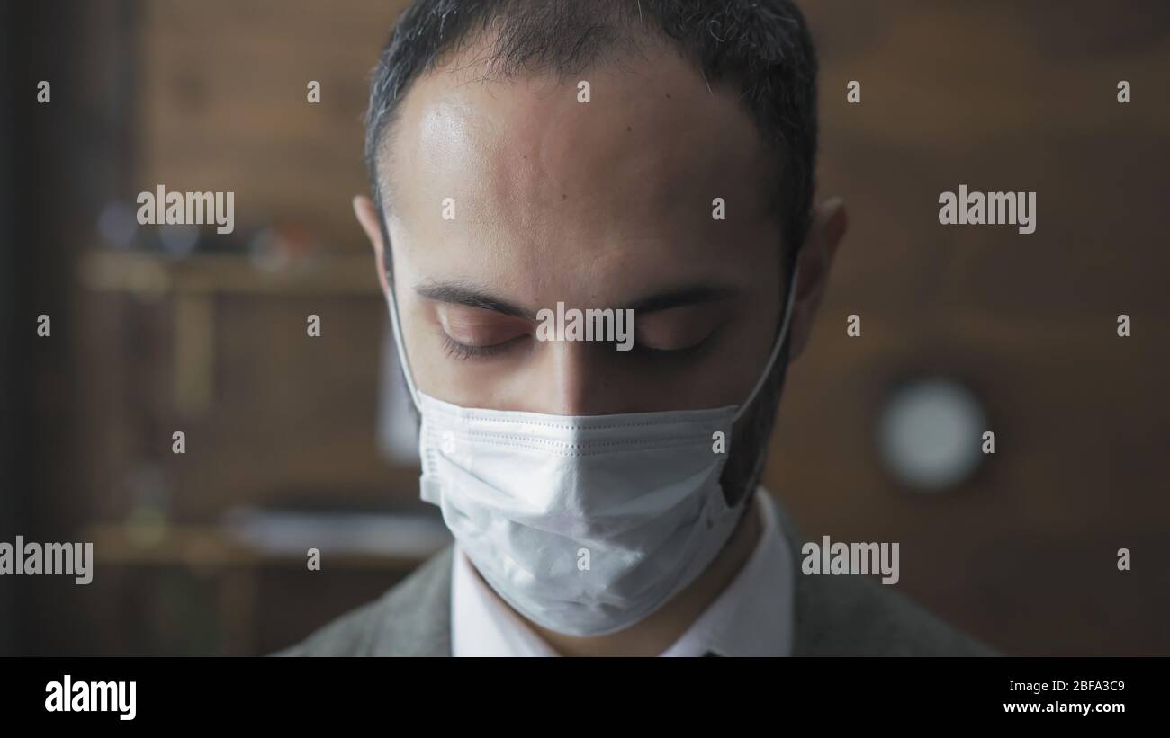 Businessman in sad mask hi-res stock photography and images - Alamy