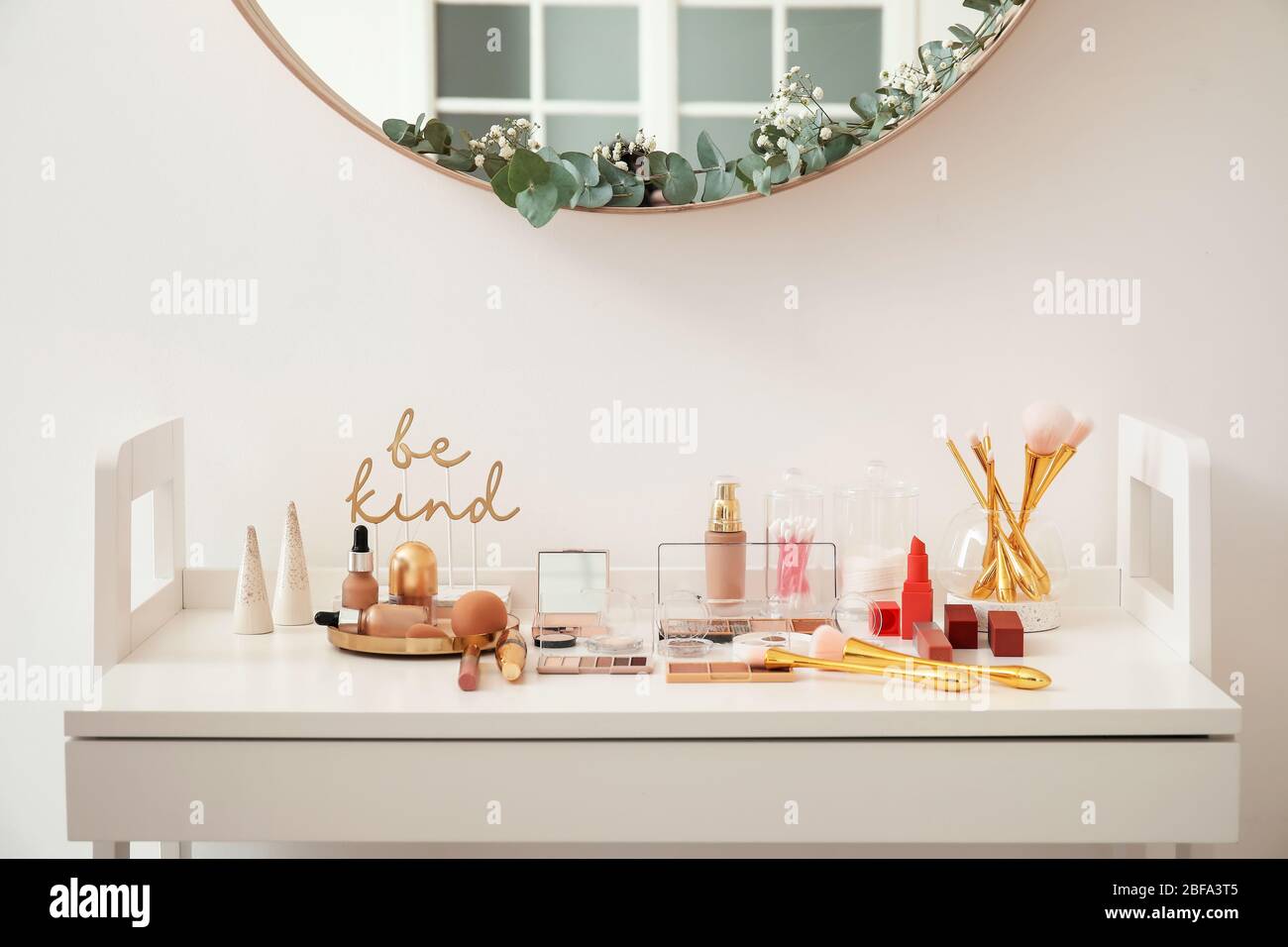 Different cosmetics on table of makeup artist Stock Photo - Alamy