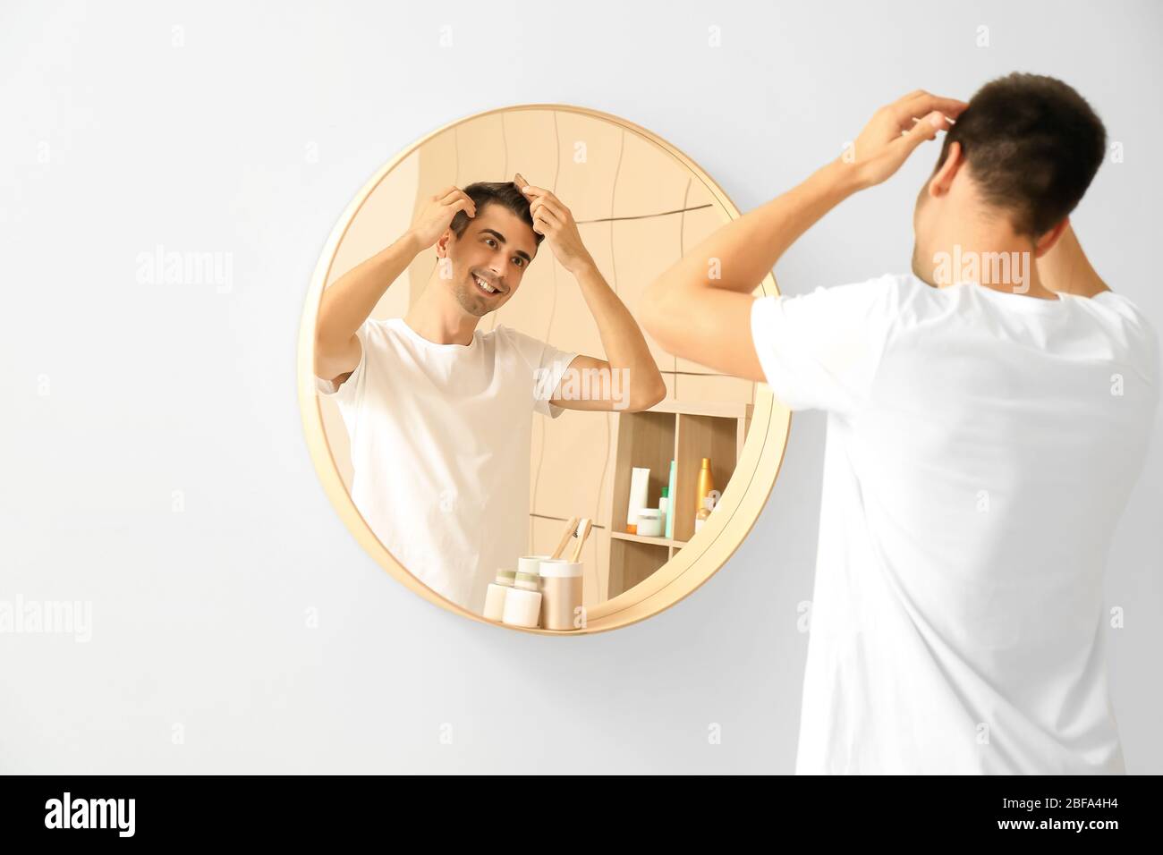 Portrait handsome guy combing hi-res stock photography and images - Alamy