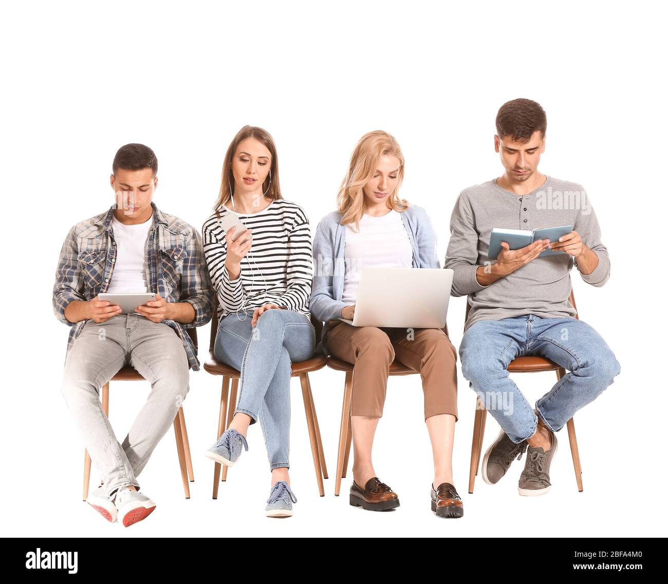 Young people waiting in line on white background Stock Photo - Alamy