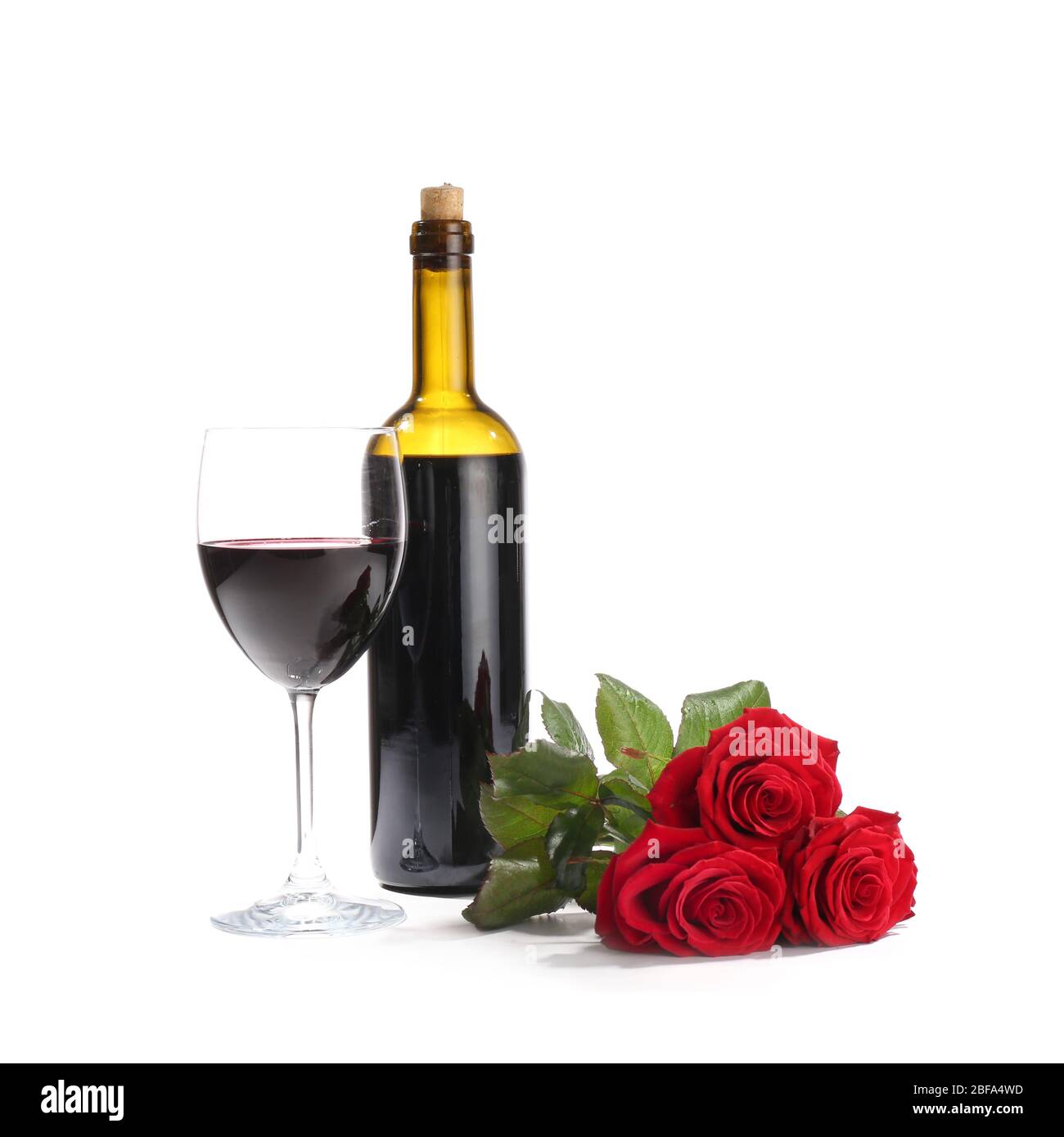 Glass and bottle of wine with rose flowers on white background Stock ...