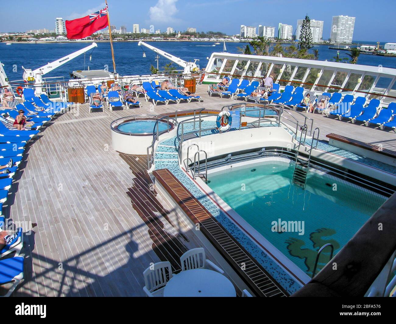 QE2 Pool Deck with sunbathers Stock Photo - Alamy