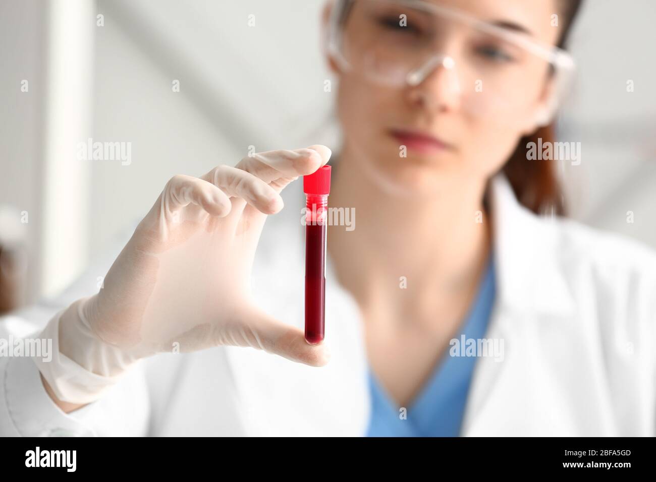 Doctor working with blood samples in laboratory Stock Photo - Alamy