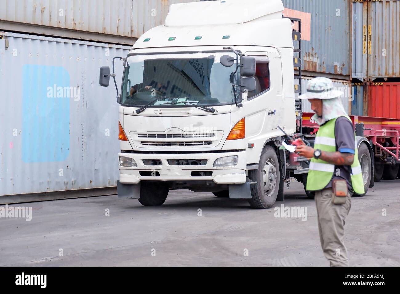 Trucks come to pick up containers for export, import, transportation ...