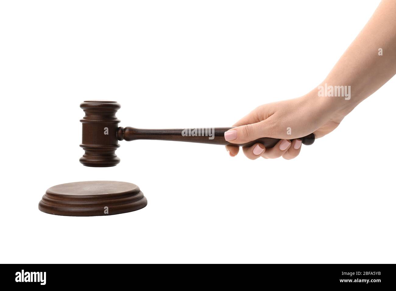 Female hand with judge's gavel on white background Stock Photo - Alamy