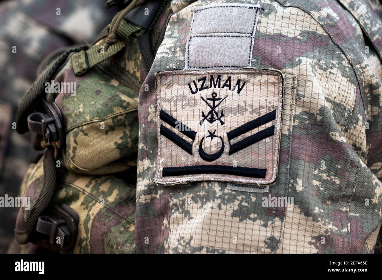 Turkish sergeant soldiers logo written which is “Uzman” on shoulder ...