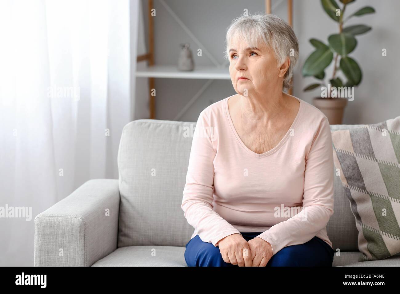 Elderly woman suffering from dementia hi-res stock photography and ...