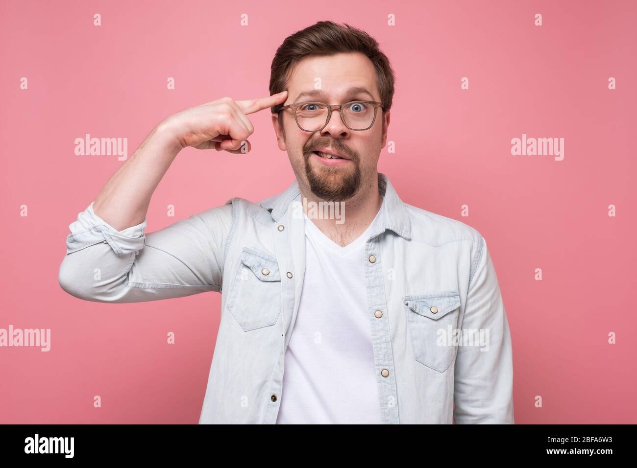 Facial expressions and emotions concept. Puzzled young man has ...