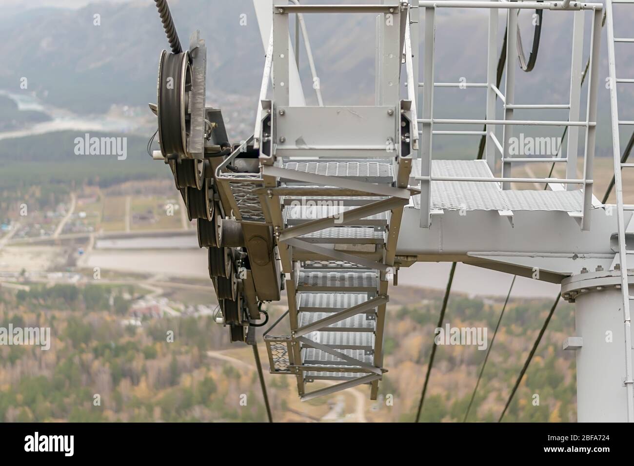 view of the wheels of the cable car lift in a tourist resort on the top ...