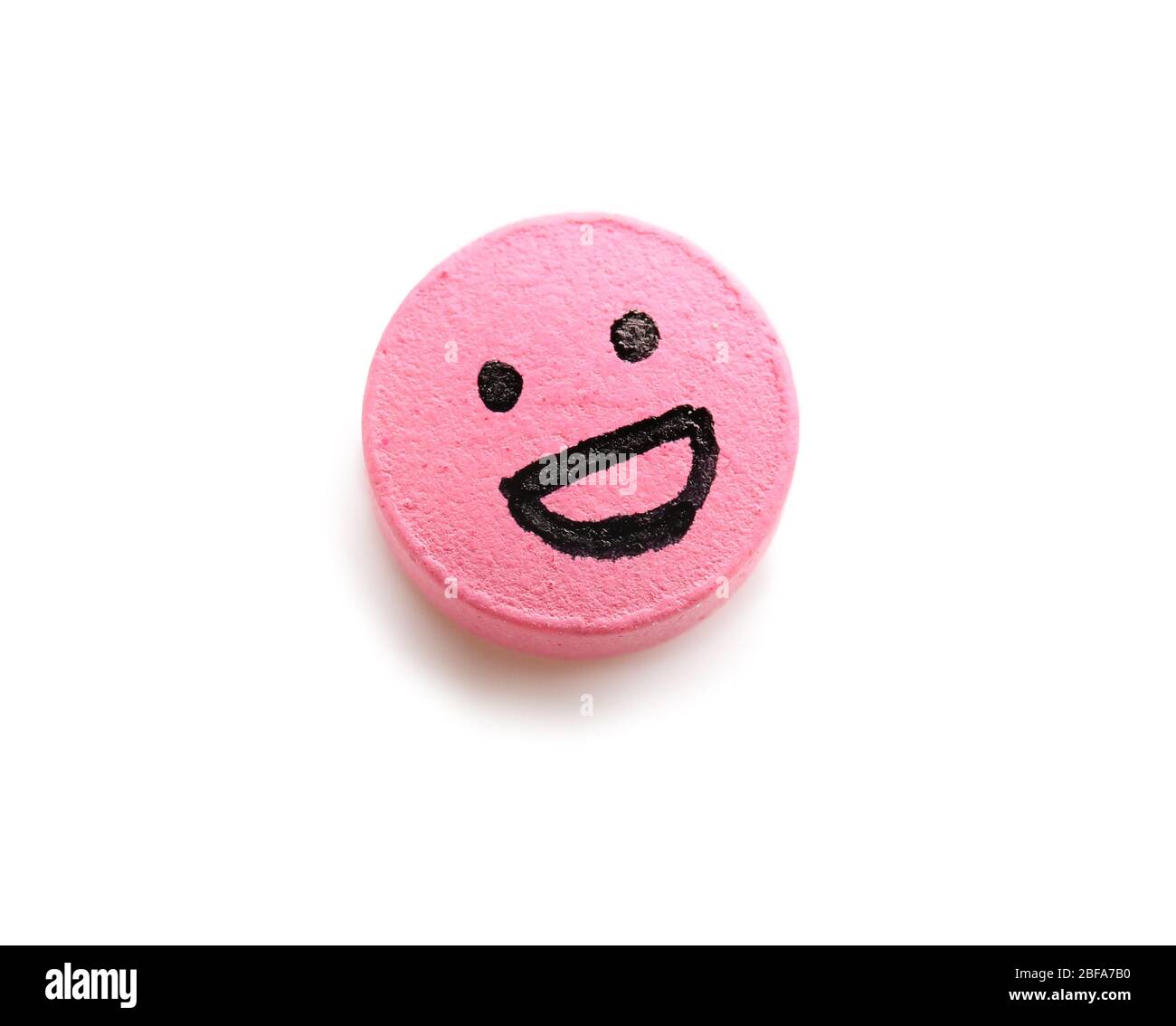 Pill with drawn face on white background Stock Photo - Alamy