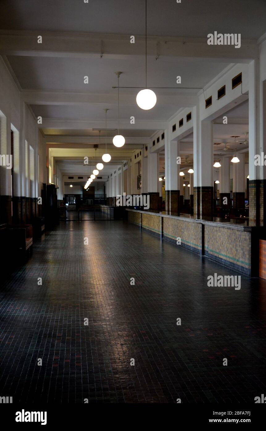 An empty customer hall inside an old bank building Stock Photo - Alamy