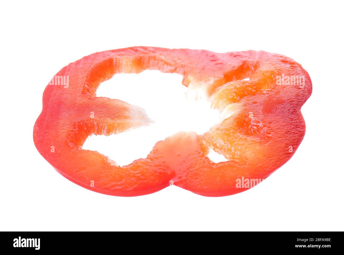 Slice of pepper on white background Stock Photo - Alamy