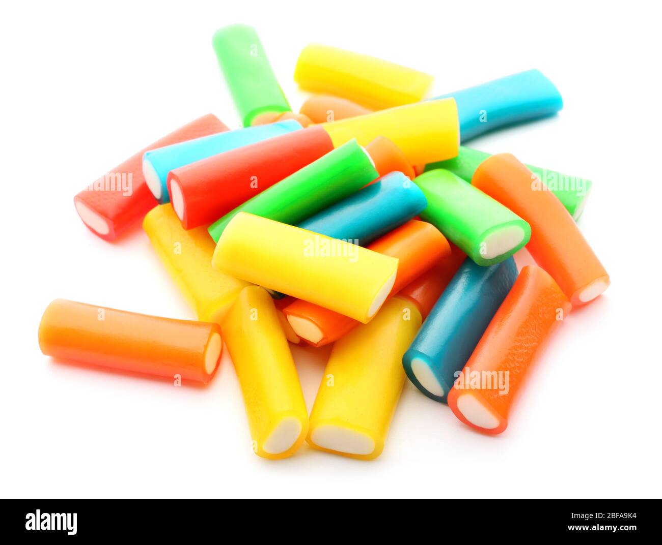 Sweet chewing candies on white background Stock Photo - Alamy