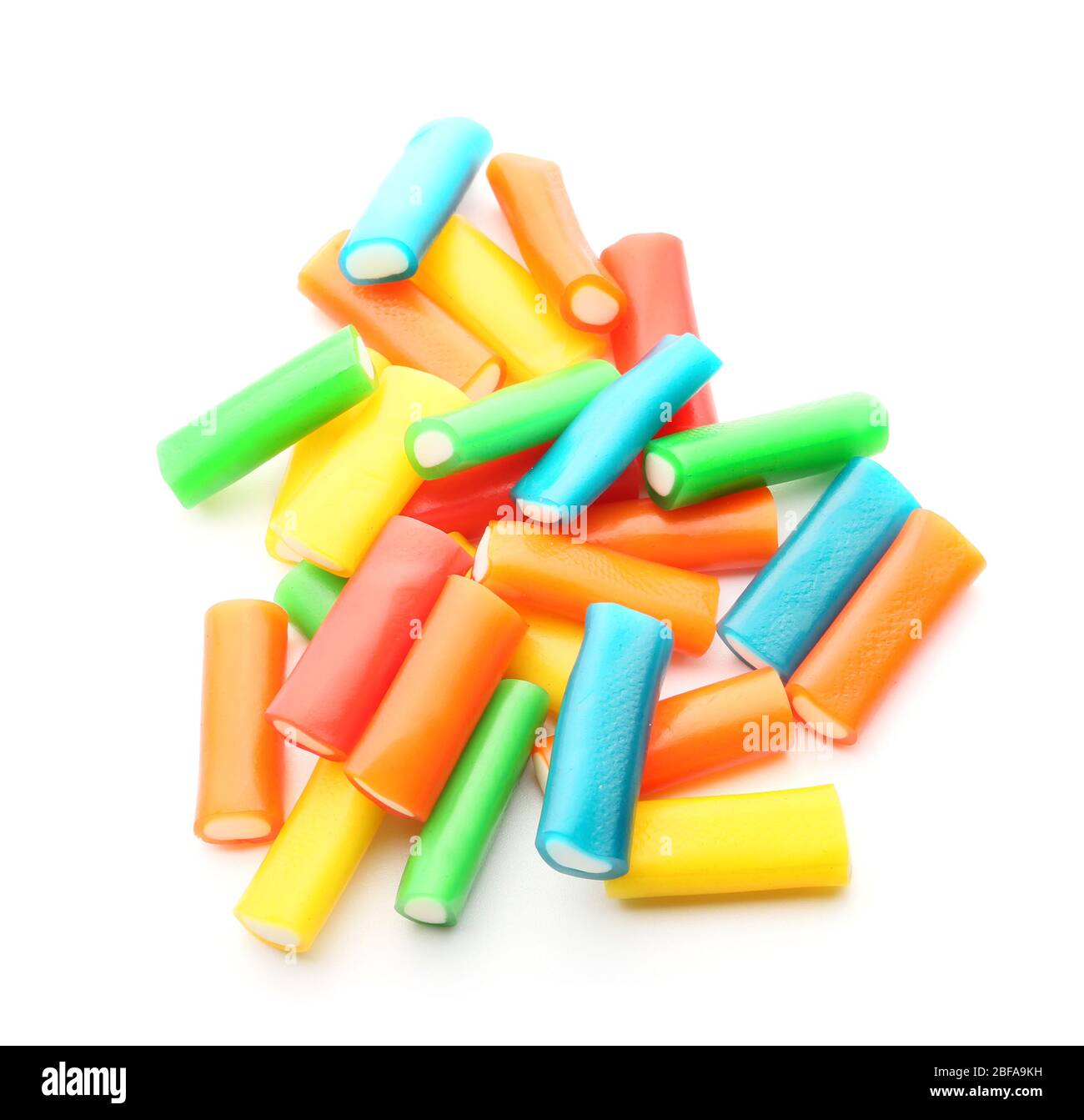 Sweet chewing candies on white background Stock Photo - Alamy