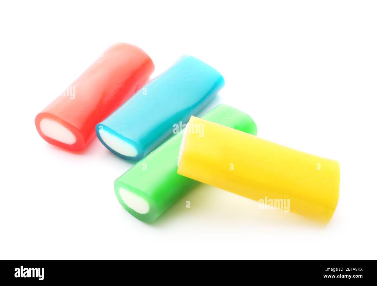 Sweet chewing candies on white background Stock Photo - Alamy