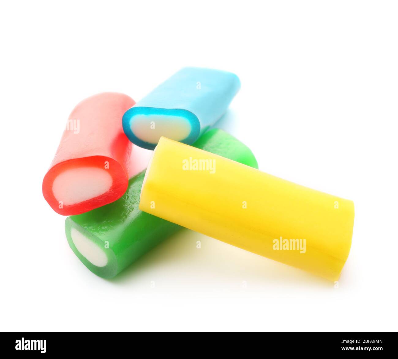 Sweet chewing candies on white background Stock Photo - Alamy