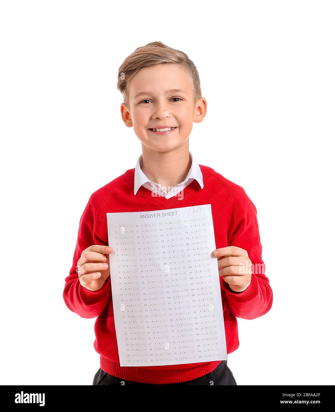 Pupil with answer sheet for school test on white background Stock Photo ...