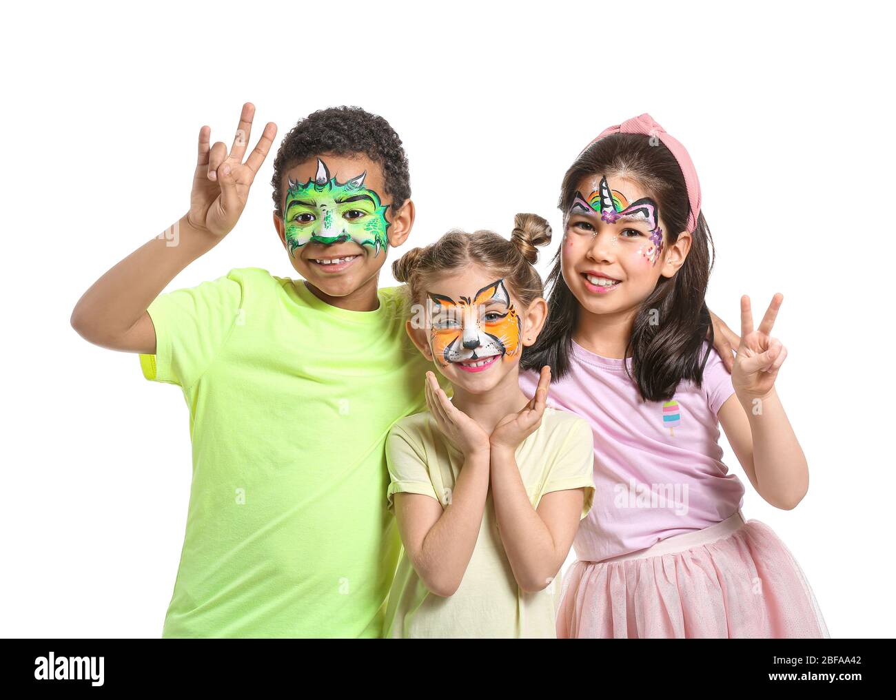 Funny children with face painting on white background Stock Photo - Alamy