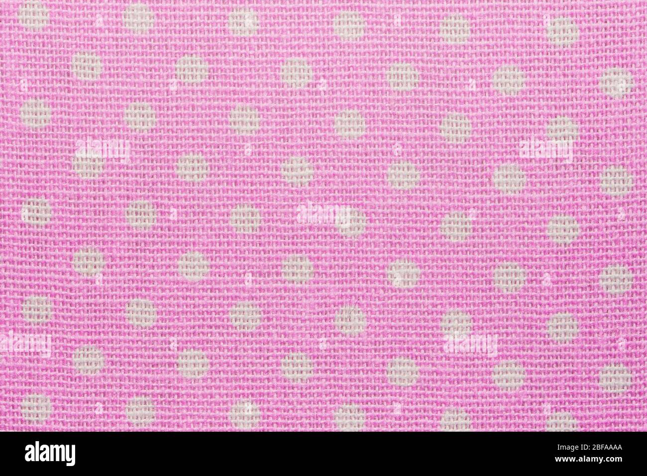 Pink and white spot pattern can be used for background. Polka dot macro ...