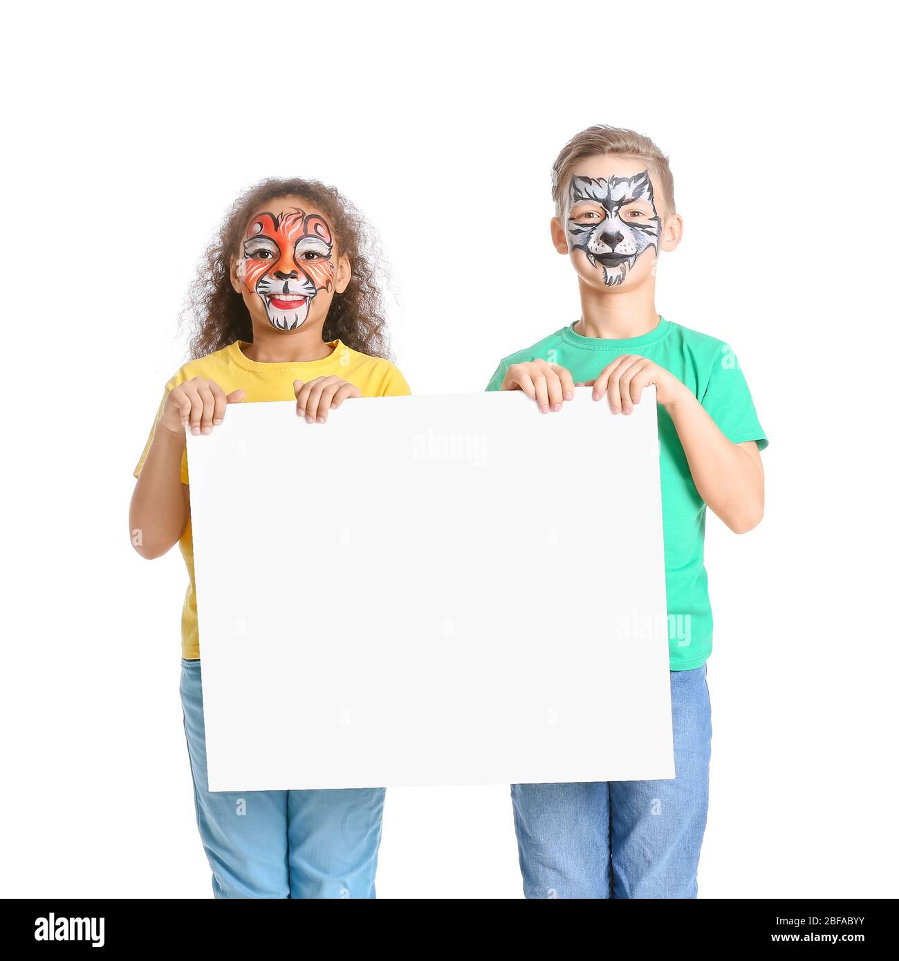 Funny children with face painting and blank poster on white background ...
