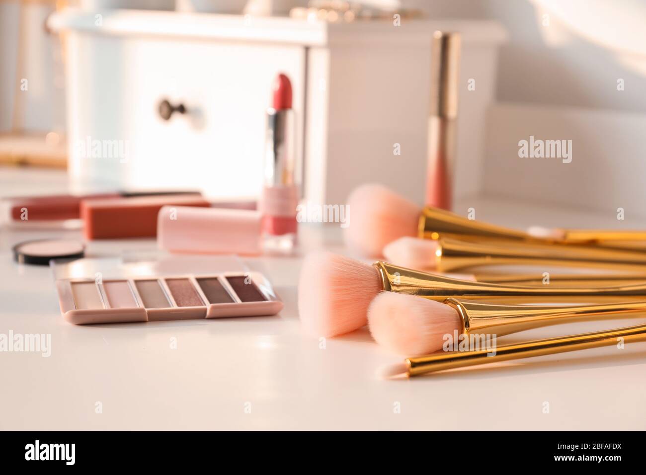 Set of brushes and decorative cosmetics on table of makeup artist Stock ...