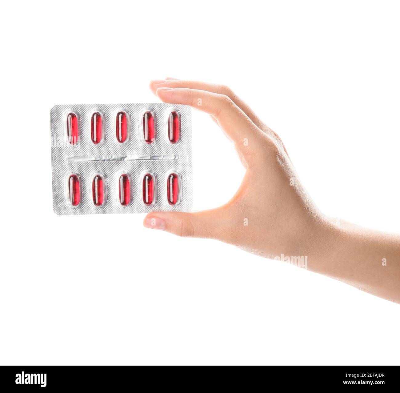 Female hand with pills on white background Stock Photo - Alamy