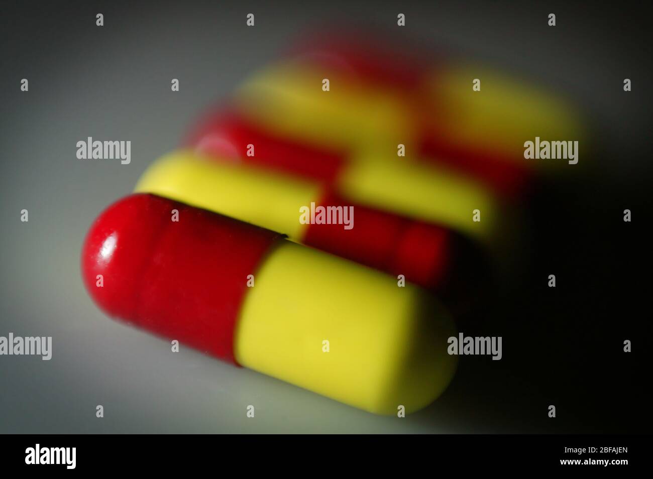 Pharmaceuticals drug drugs red yellow hi-res stock photography and ...