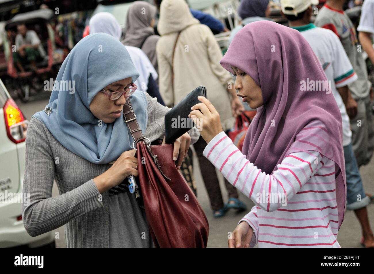 Two veiled young women on the street in Yogyakarta, Java, Indonesia ...