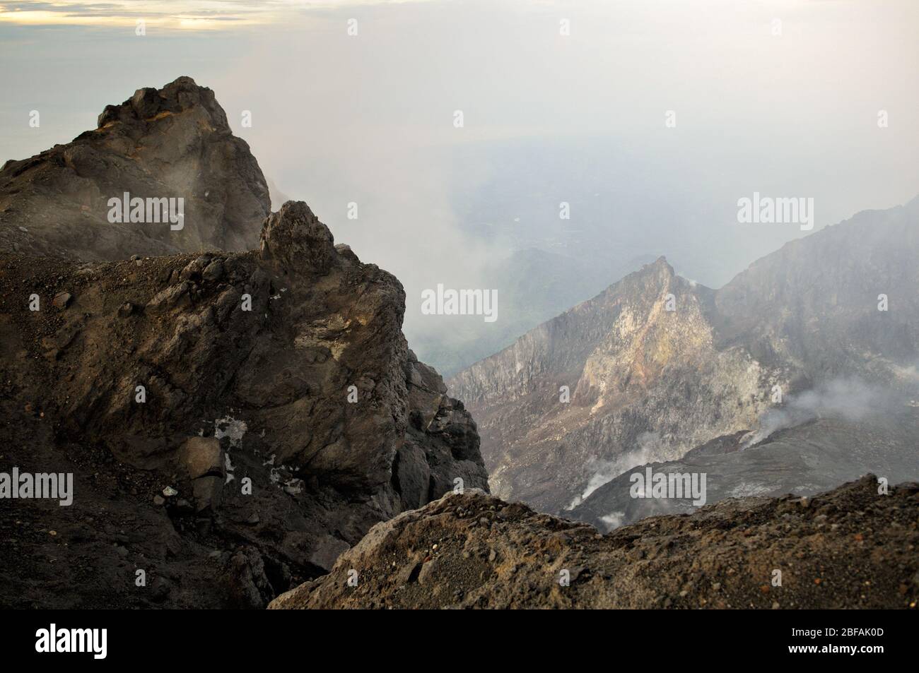 Clouds and smoke at the top of Merapi volcano, Java, Indonesia Stock ...