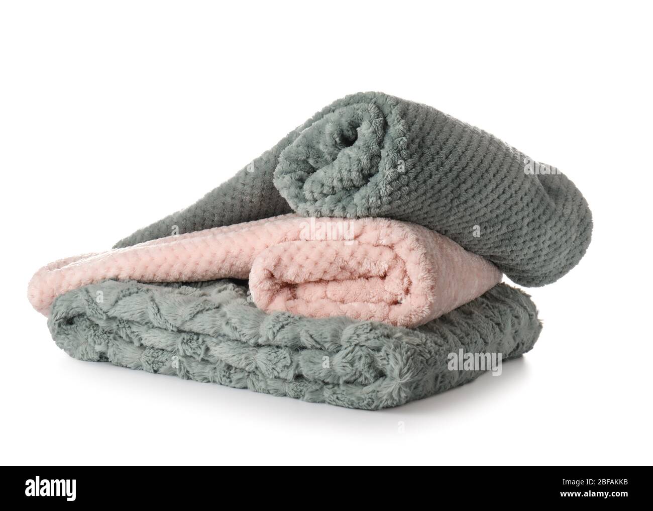Soft blankets on white background Stock Photo - Alamy