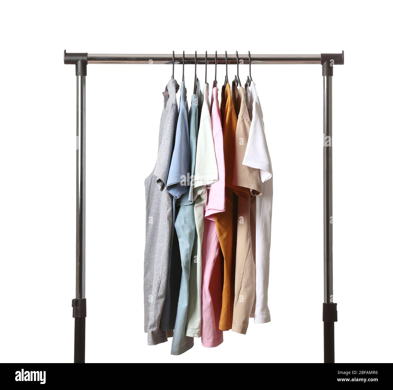 Rack with modern clothes on white background Stock Photo - Alamy