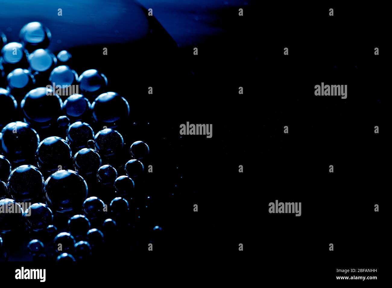 Refreshing bubbles close up cluster of round water spheres. Air and ...